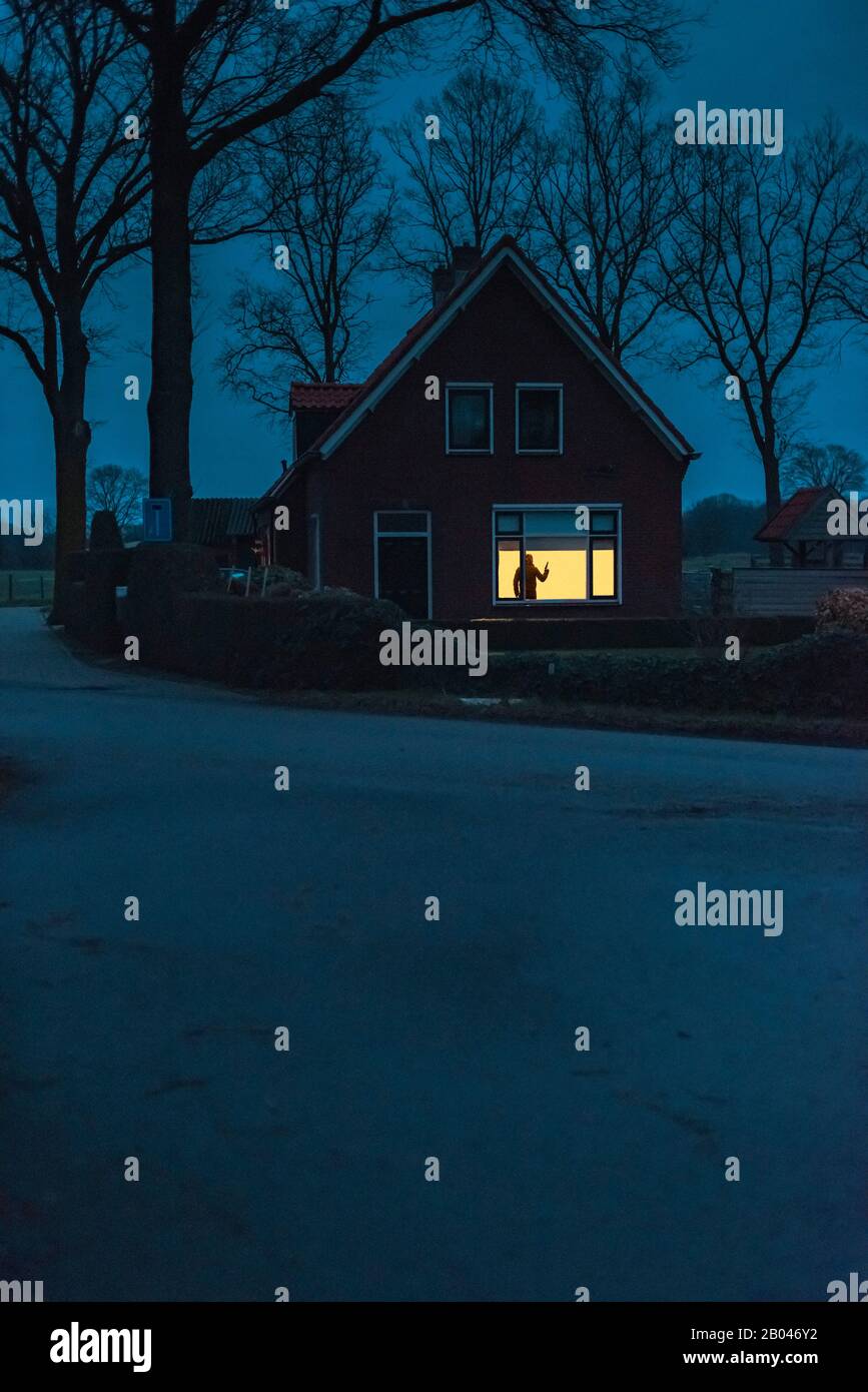 Night illuminated windows man home hi-res stock photography and images ...