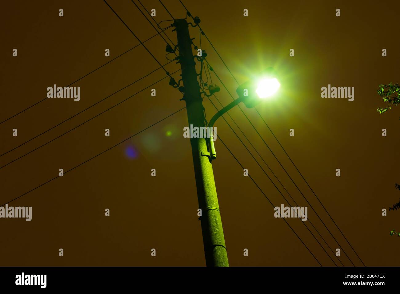 Telephone pole with a streetlight hi-res stock photography and images ...
