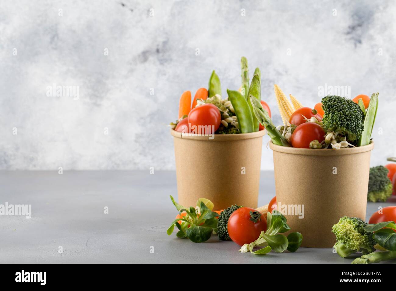 Healthy food in disposable eco friendly food packaging. Vegetables in ...