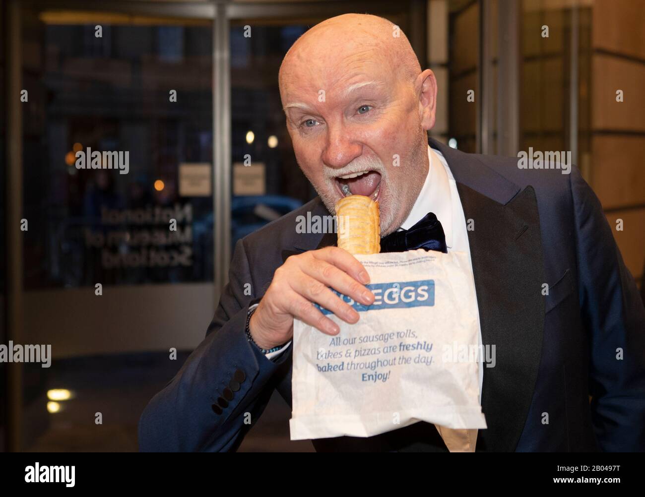 Sir Tom Hunter eats a Greggs sausage roll ahead of the Hunter ...