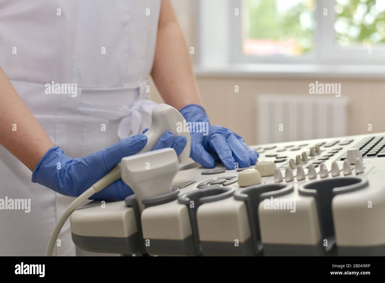 The process of conducting the ultrasound treatment procedure Stock ...