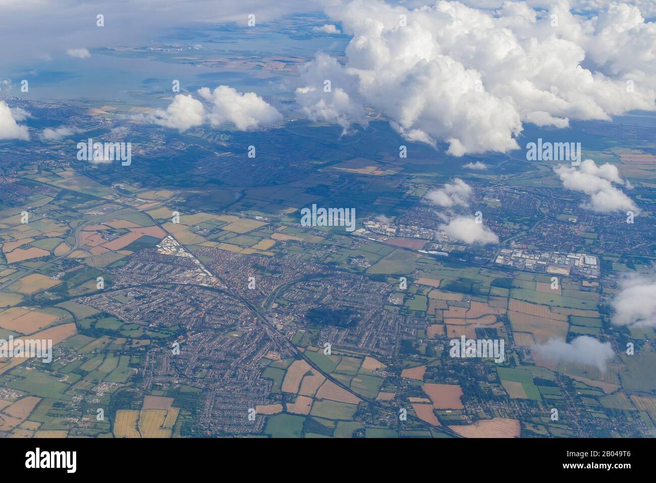 Aerial sunny view of rural landscape of UK from a window seat in an ...