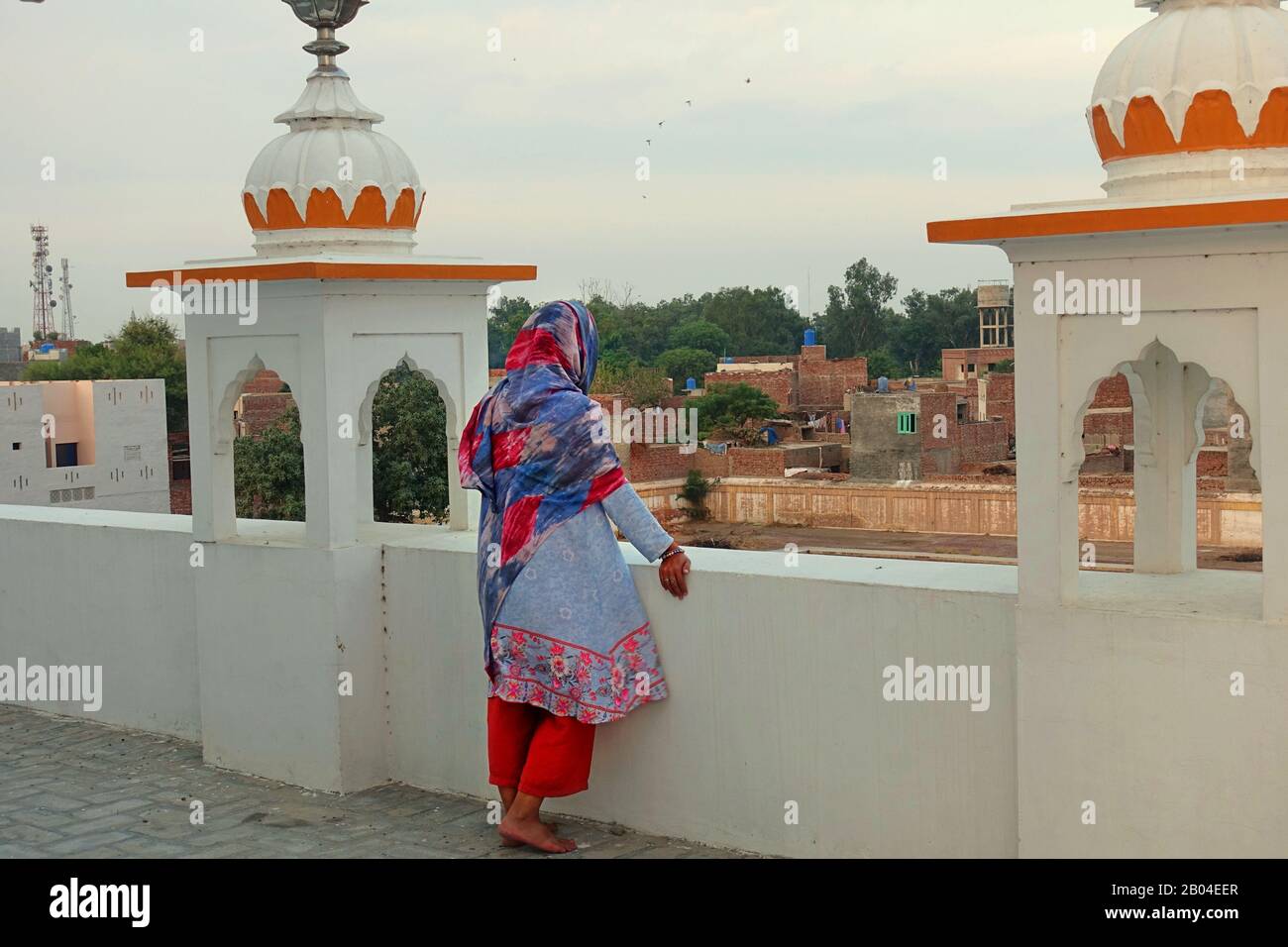 Sikh woman at Gurudwara Sahib the birthplace of Guru Nanak in Pakistan ...