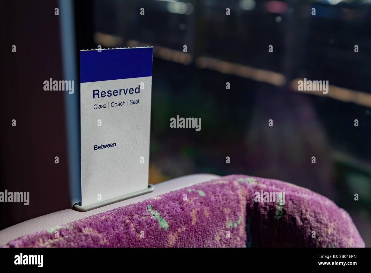 Close up shot of a Reserved train ticket plug into a chair at Lake ...