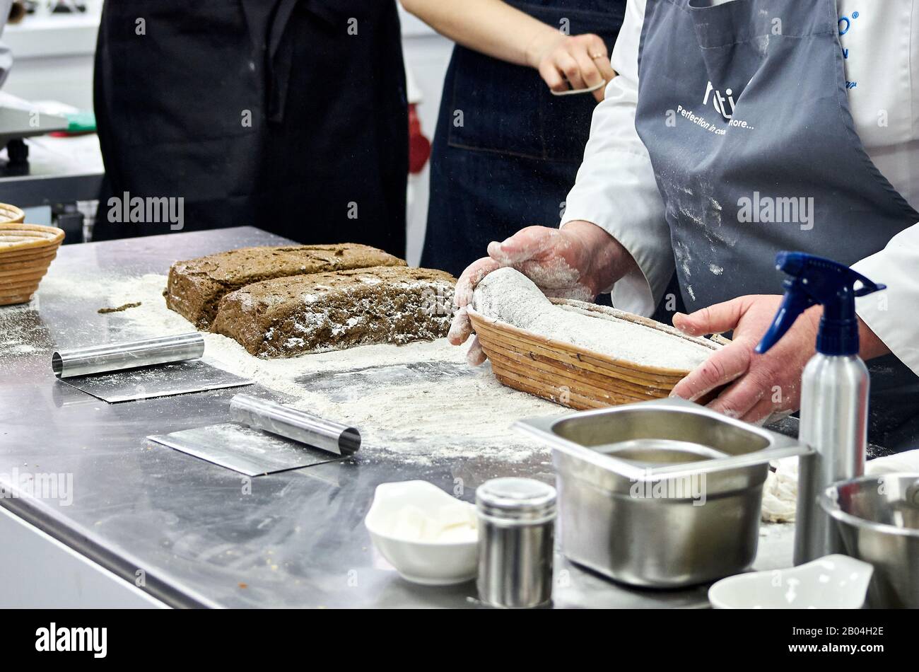 teacher baker teaches making homemade bread according to the recipe ...