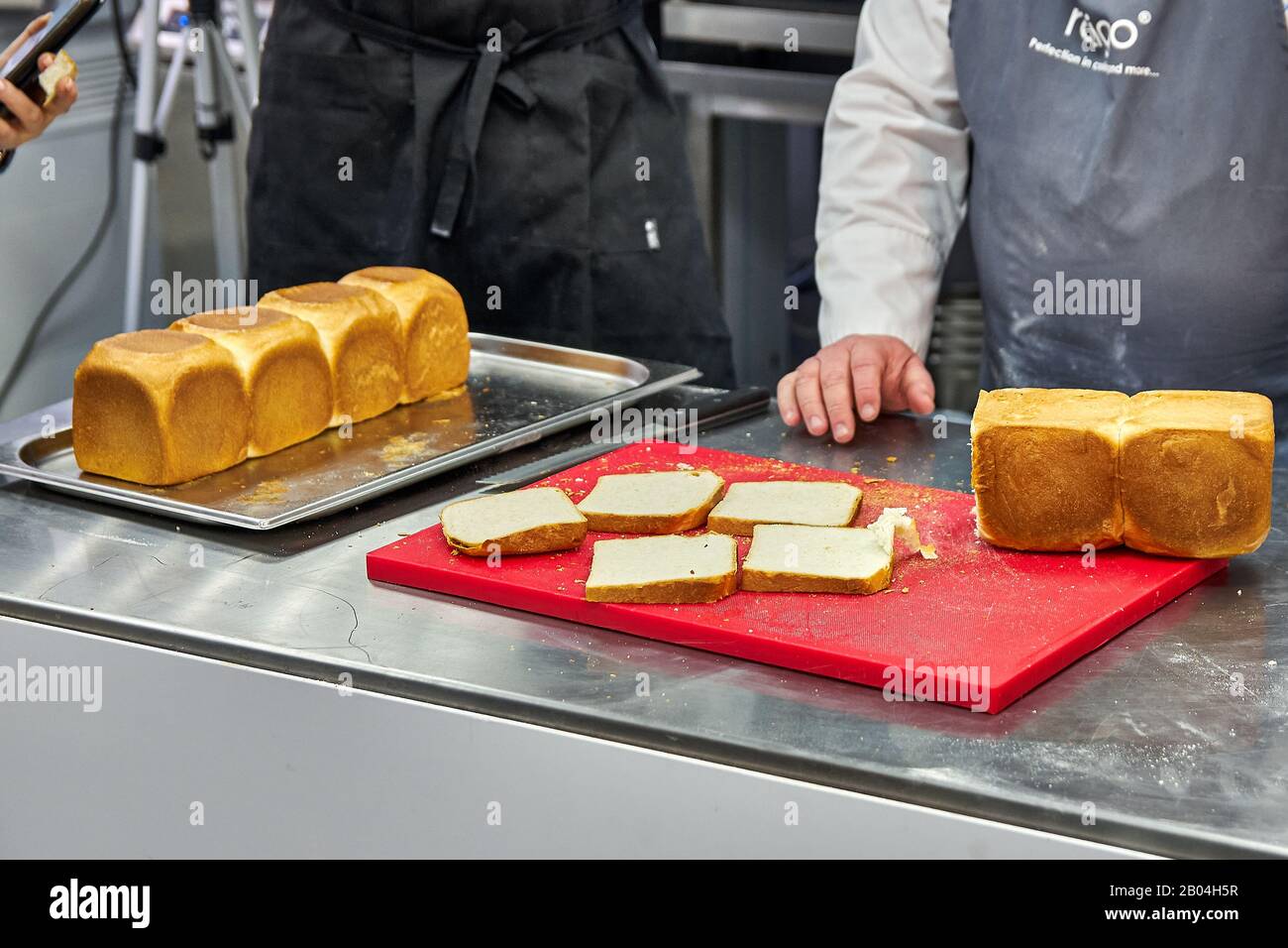 teacher baker teaches making homemade bread according to the recipe ...