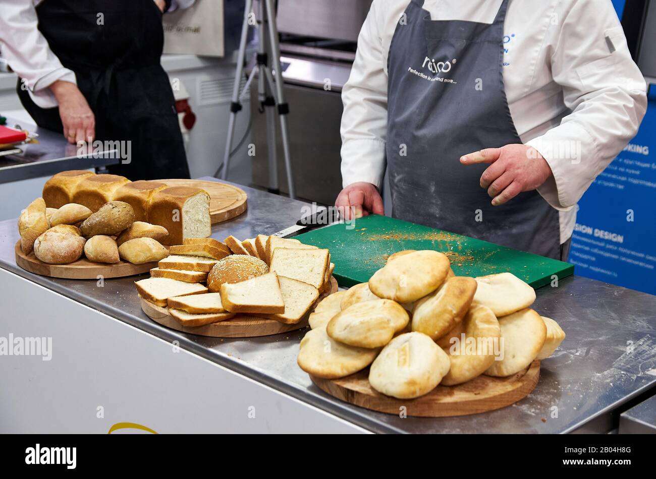 teacher baker teaches making homemade bread according to the recipe ...