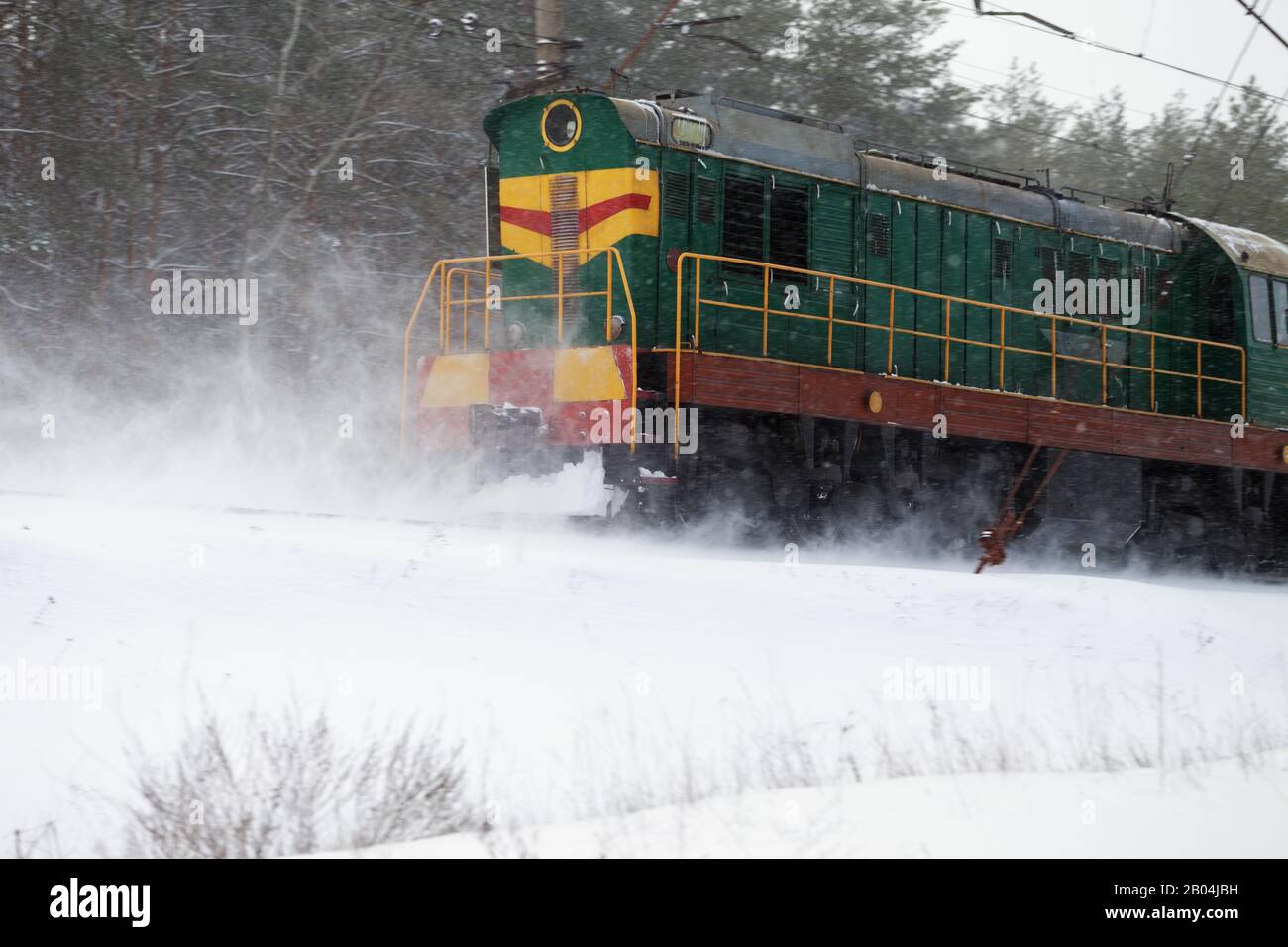Covered wagon train in snowstorm hi-res stock photography and images ...