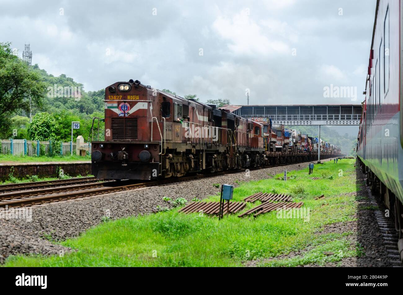 Ro-Ro (Roll On Roll Off) train carrying trucks at Khed Railway Station ...