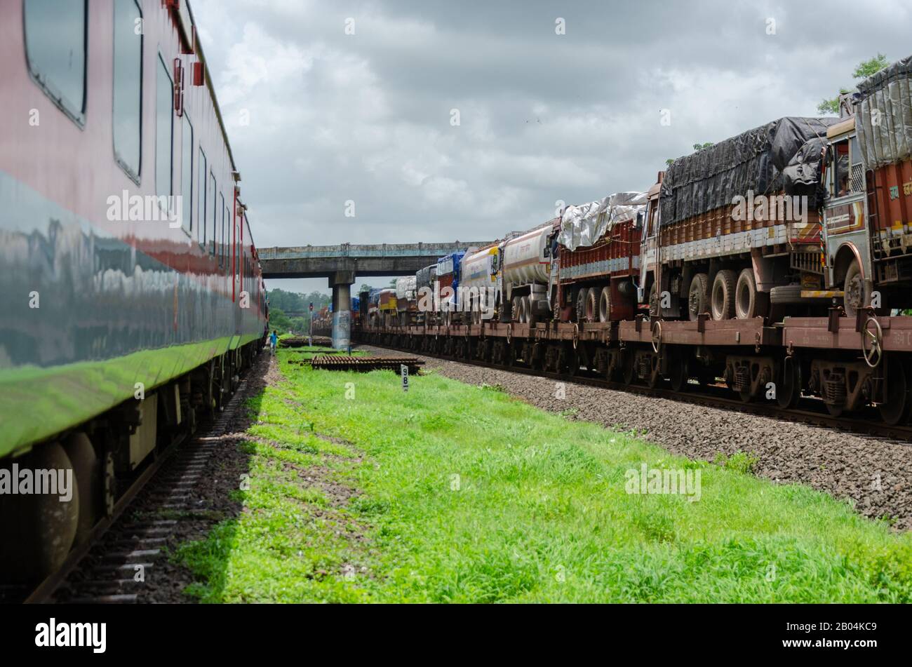 Ro-Ro (Roll On Roll Off) train carrying trucks at Khed Railway Station ...