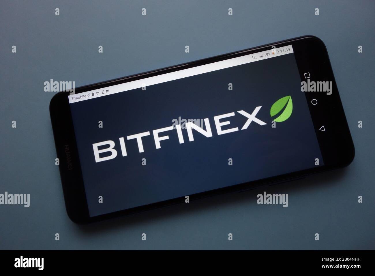 Bitfinex cryptocurrency exchange logo displayed on smartphone Stock ...