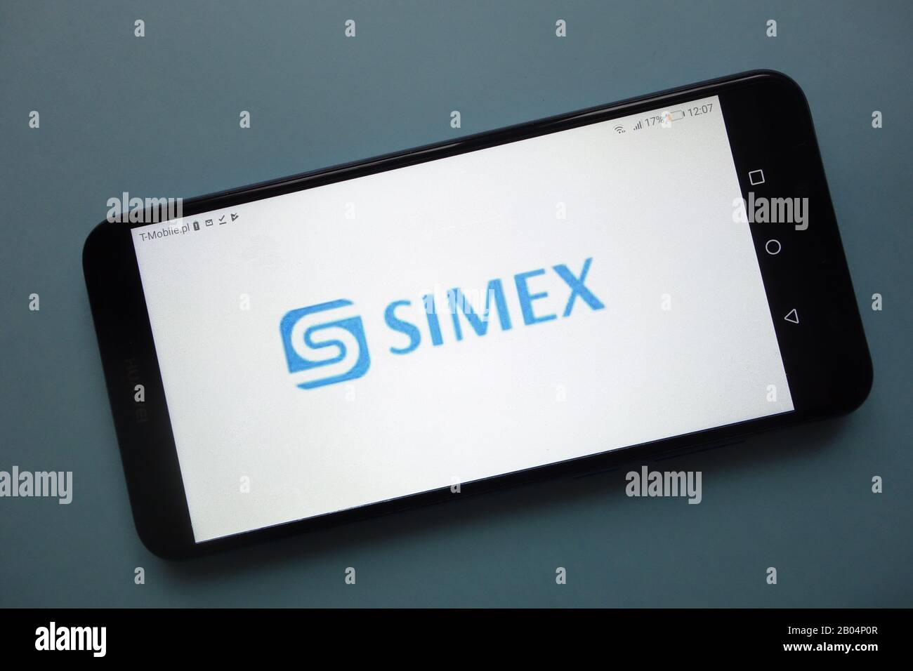 Simex cryptocurrency exchange logo displayed on smartphone Stock Photo ...