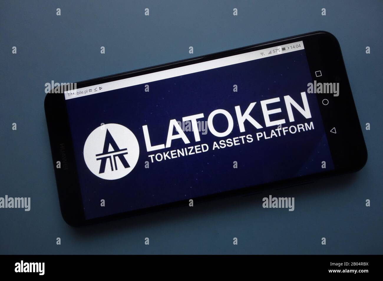 Latoken cryptocurrency exchange logo displayed on smartphone Stock ...