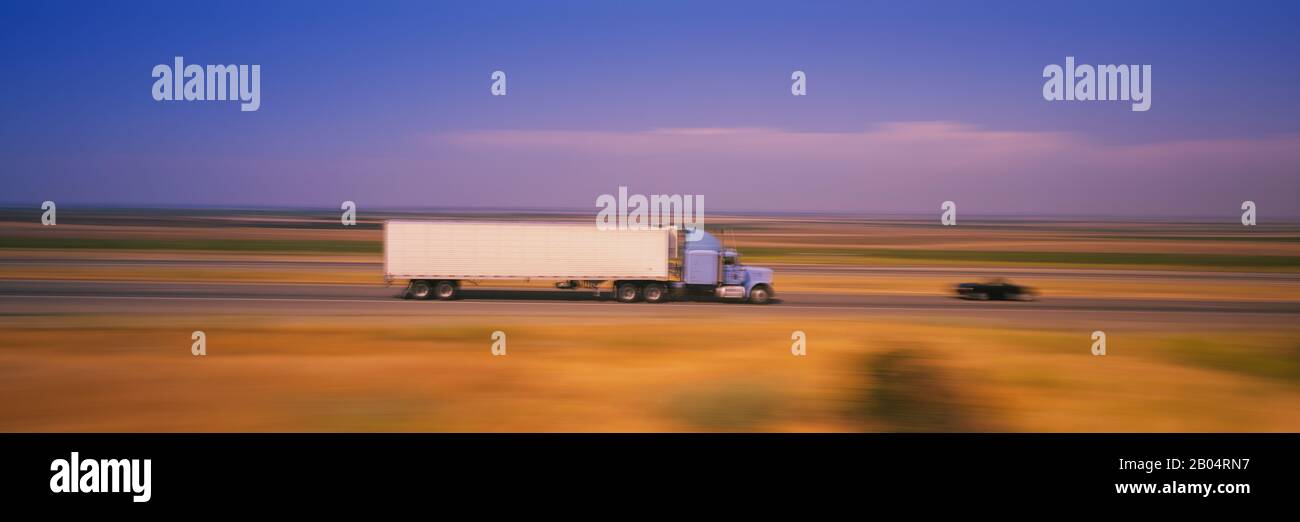 Truck moving on the road hi-res stock photography and images - Alamy