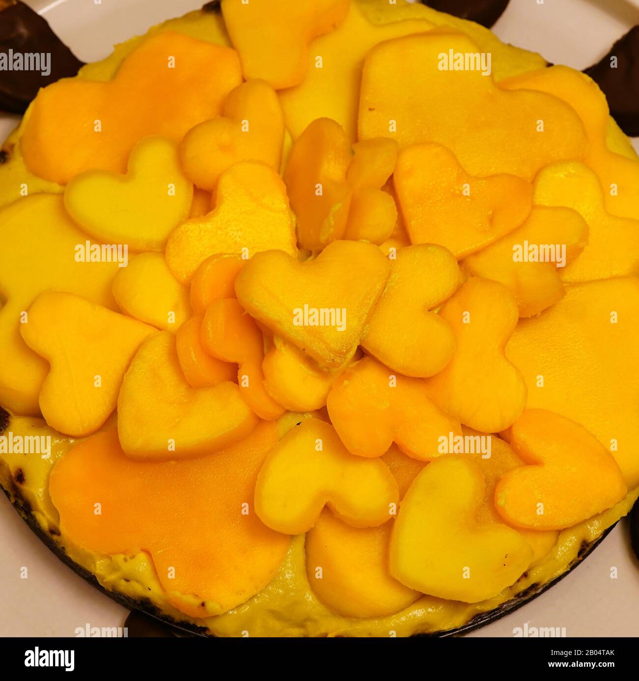 Homemade vegan mango tart with heart-shaped fresh mango fruit Stock ...