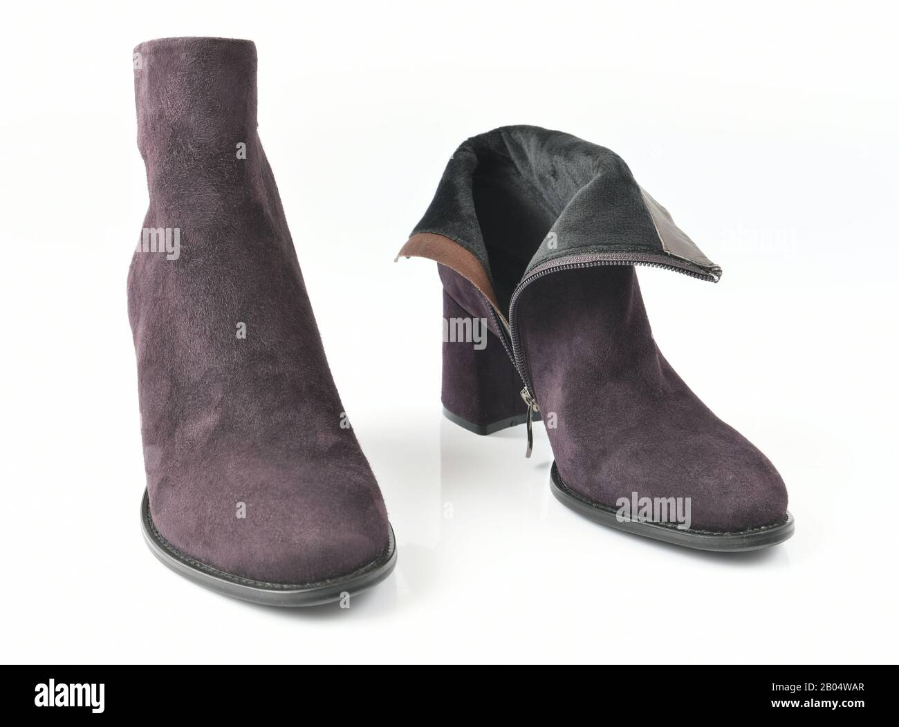 The wine-colored women boots on white background Stock Photo - Alamy