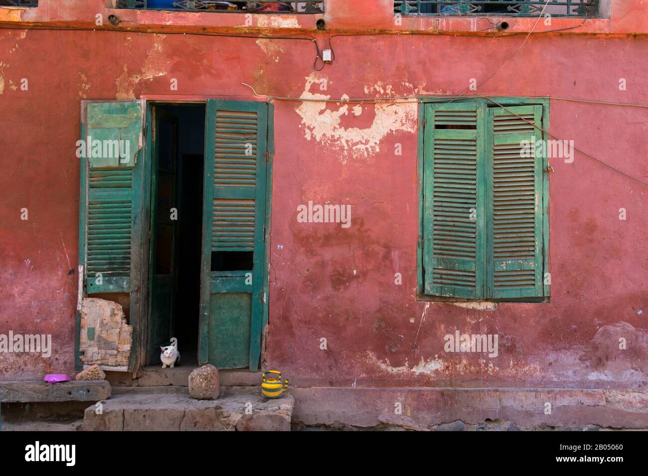Street scene with detail of old colonial houses on Goree Island in the ...