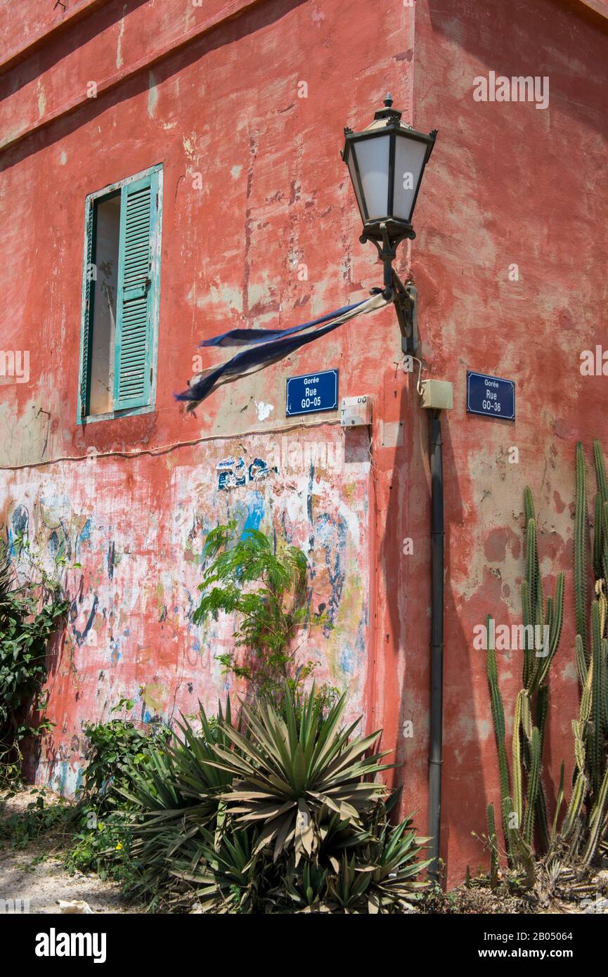 Street scene with detail of old colonial houses on Goree Island in the ...