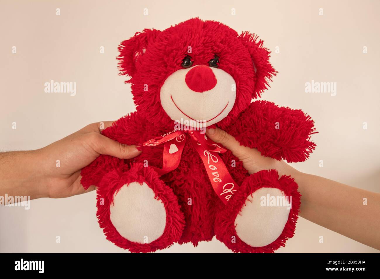 Two dolls hands hi-res stock photography and images - Alamy