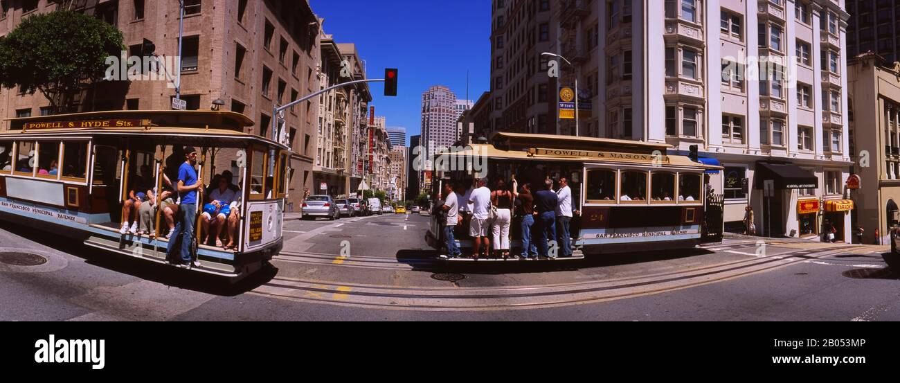 Two cable cars on a road, San Francisco, California, USA Stock Photo ...