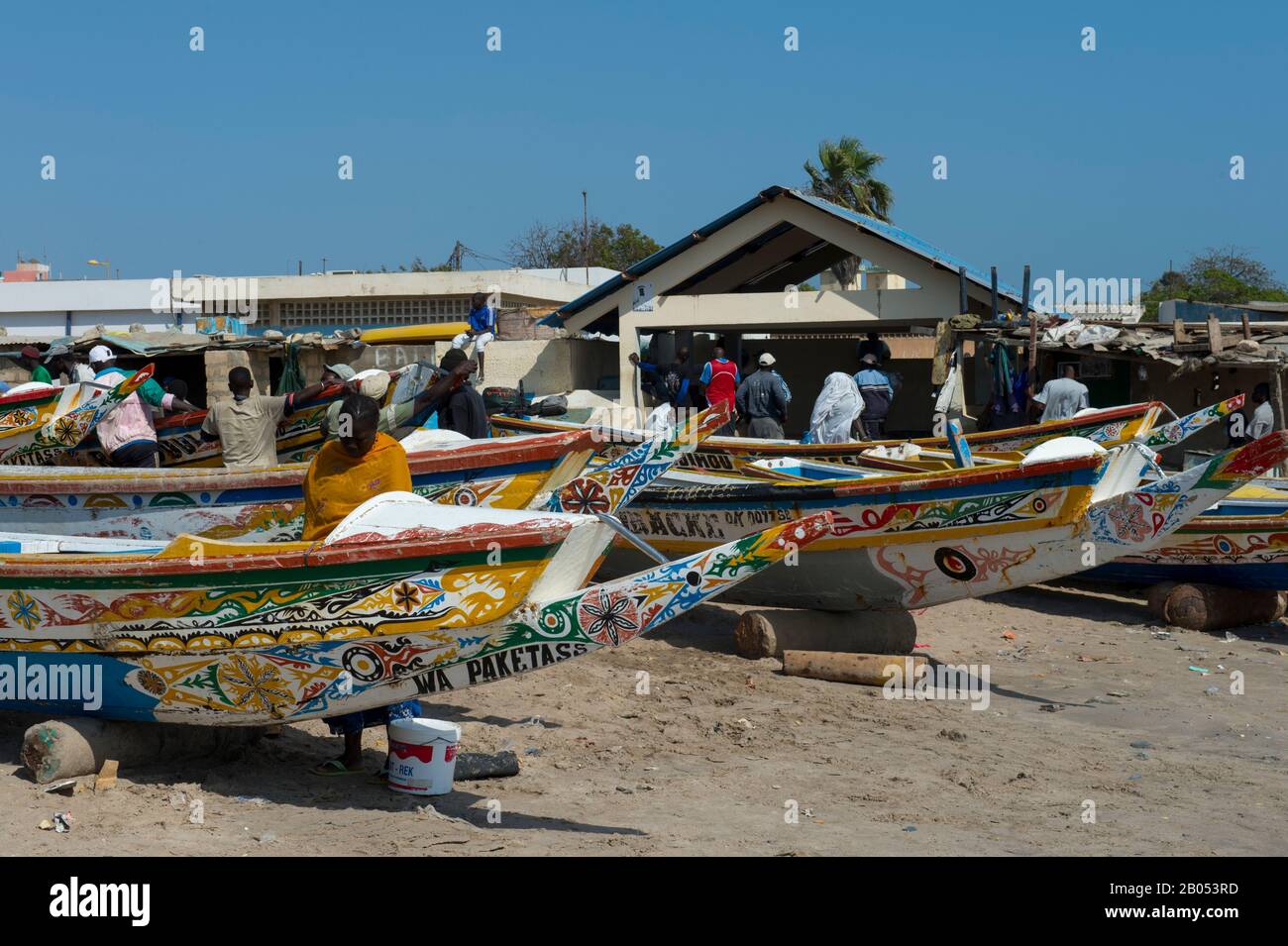 Colorful fishing boats on beach at Soumbedioune, one of the many ...