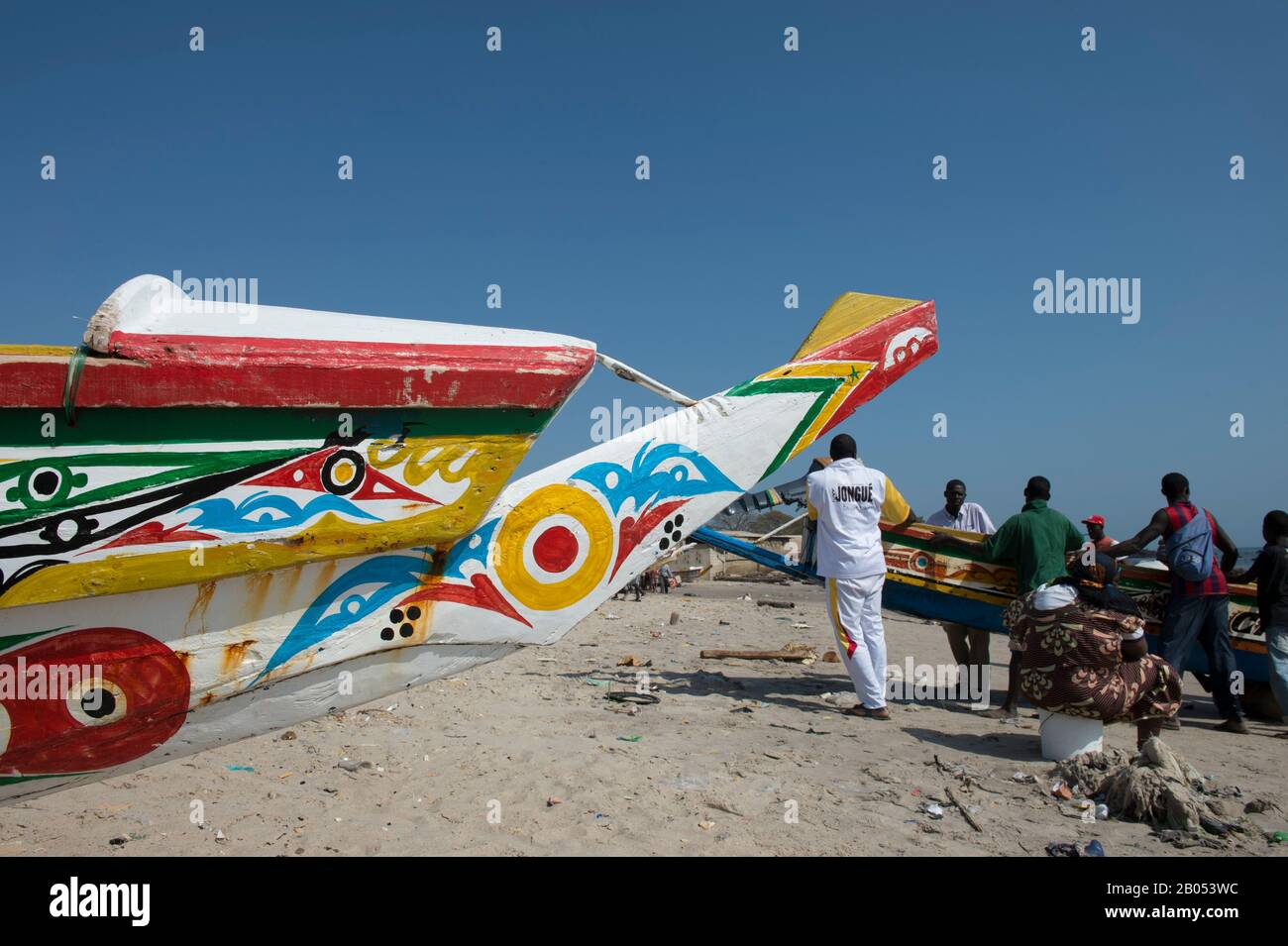 Colorful fishing boats on beach at Soumbedioune, one of the many ...
