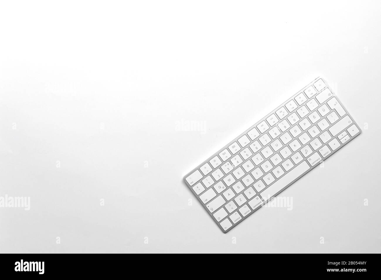 White Office Desk with Computer Keyboard copy space white background ...