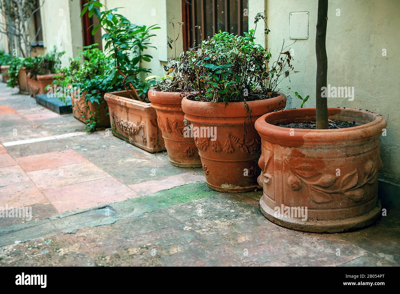street flower pots in old style Stock Photo - Alamy