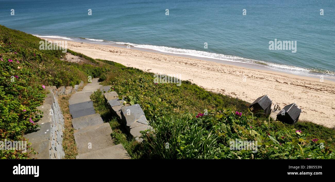 High angle view of a stepped walkway leading towards a beach ...