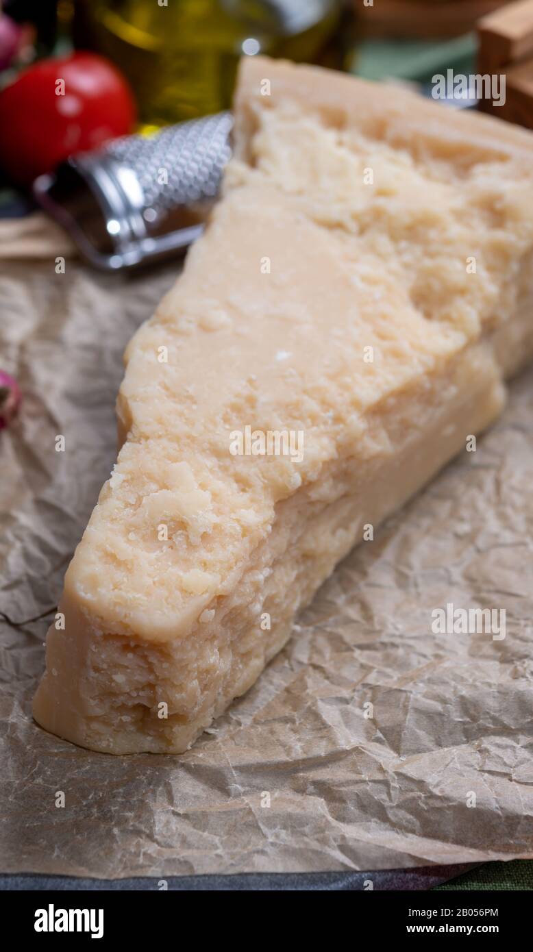 One piece of authentic Parmigiano-Reggiano or Parmesan Italian hard ...