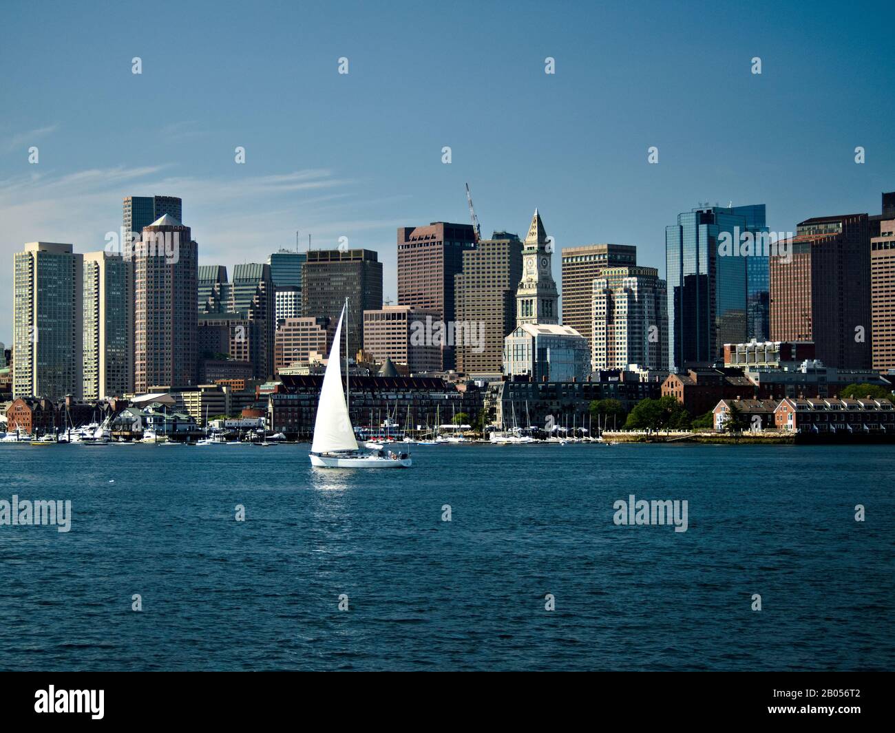 Downtown Boston with a sailboat as seen from across the harbor Stock ...