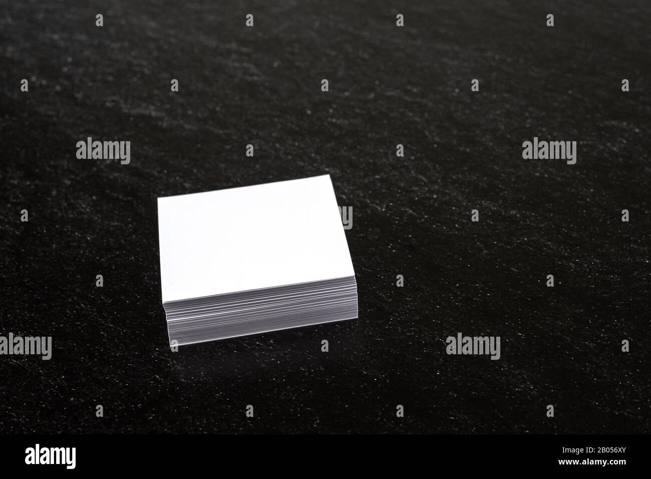 white memo papers on dark background mock up. office note papers. copy ...