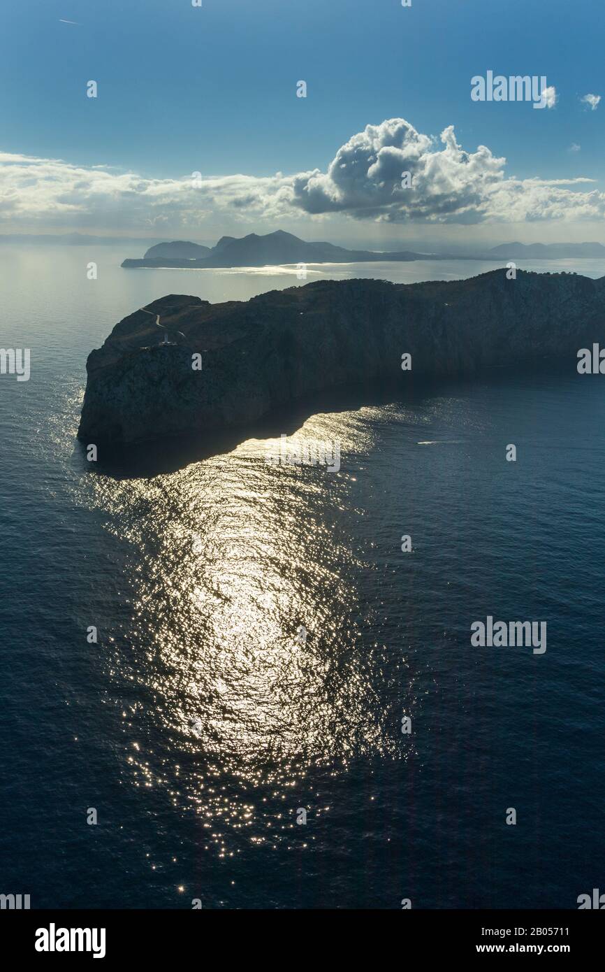 Aerial view, Cap Formentor peninsula in back light, Far de Formentor ...