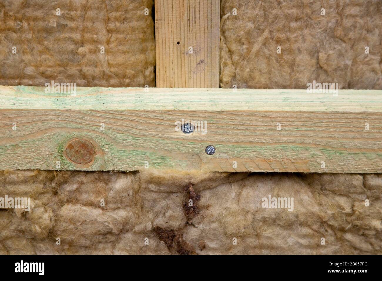 warming the walls of a stone house with a stone wool heater. Ecological ...