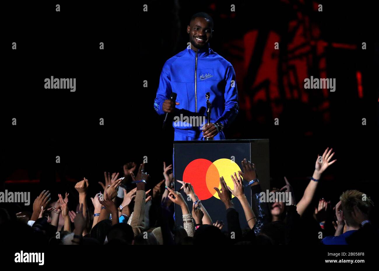 Dave with his Mastercard Album of the Year award on stage at the Brit ...