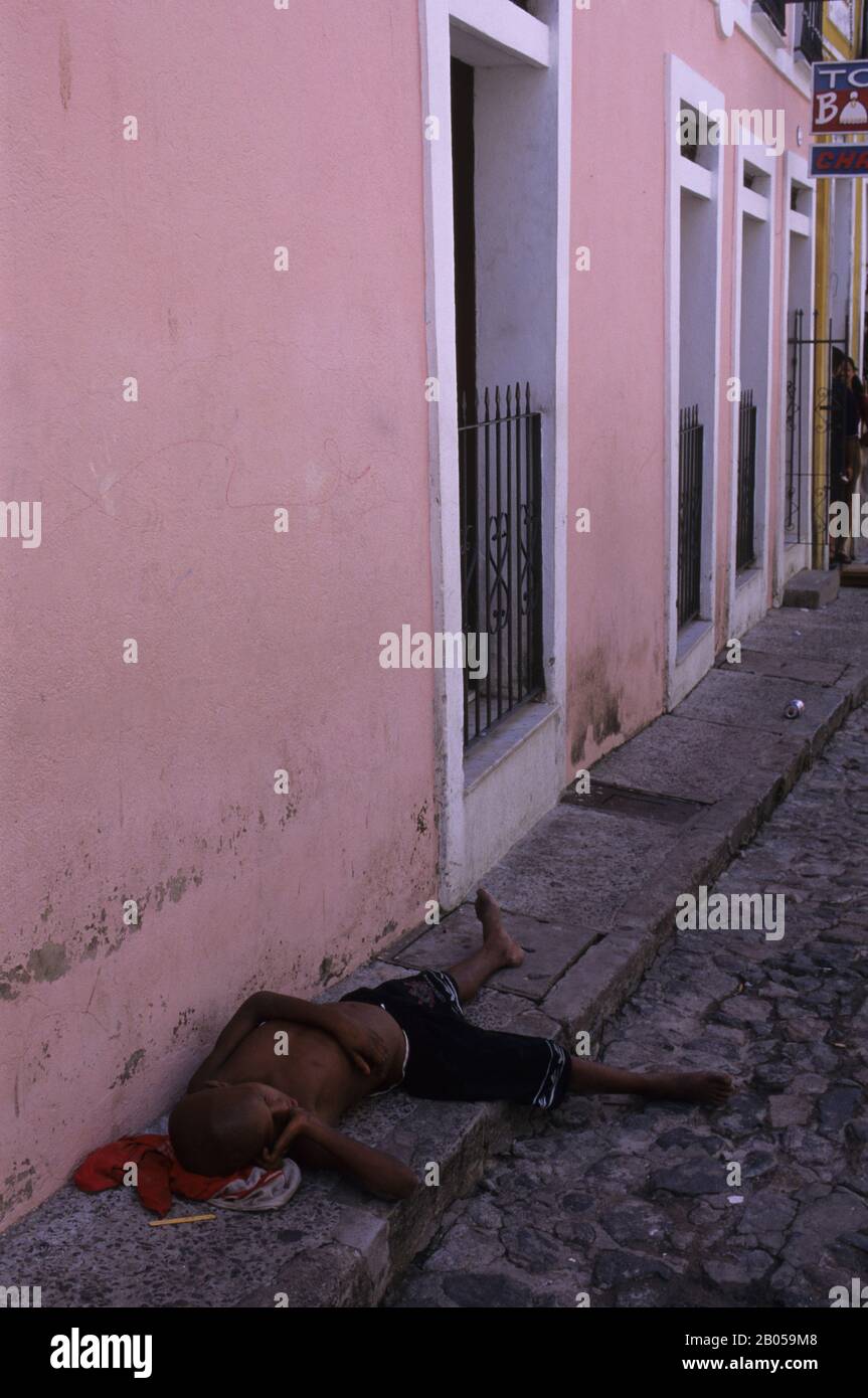 Homeless child sleeping on street hi-res stock photography and images ...
