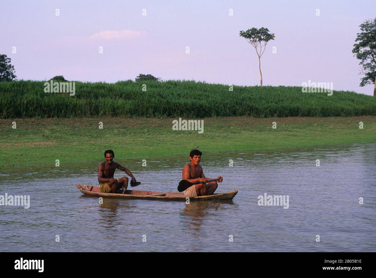 BRAZIL, AMAZON RIVER, RIO BALAIO, LOCAL MEN (CABOCOLOS) IN CANOE Stock ...