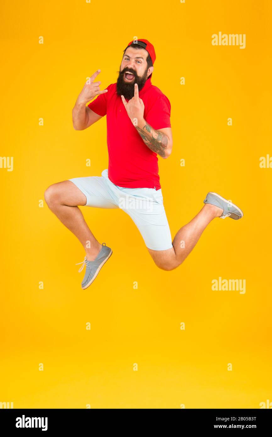 excited bearded man jumping. full of energy. Impetuous movement ...
