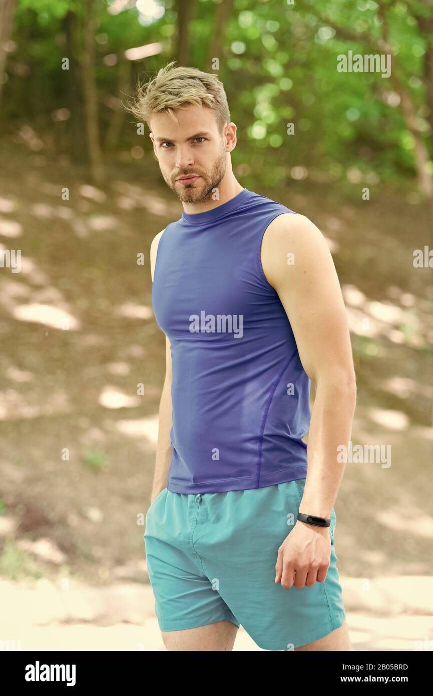 Workout in park. Daily walk for healthy life. Muscular strong fit guy ...