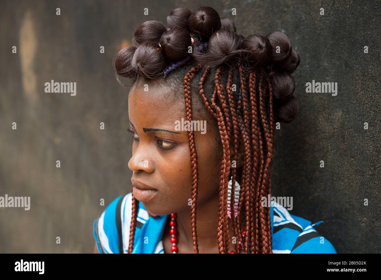 Village scene with portrait of young woman Jeneine in the Akato Viepe ...