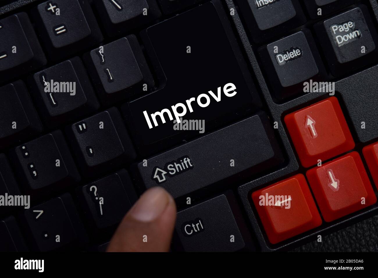 Improve isolated on laptop keyboard background Stock Photo - Alamy