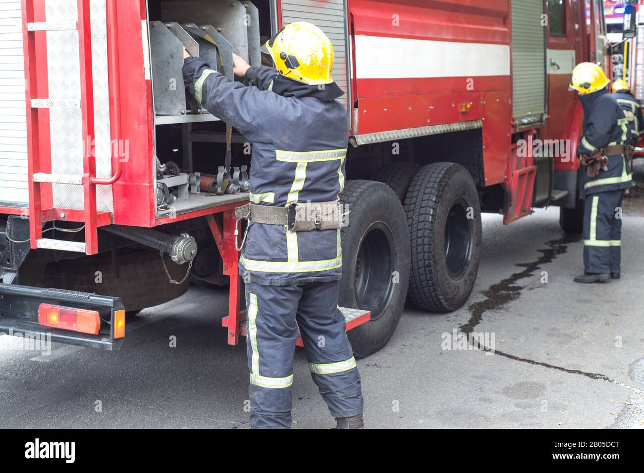 The fire brigade works at a source of ignition in a residential ...