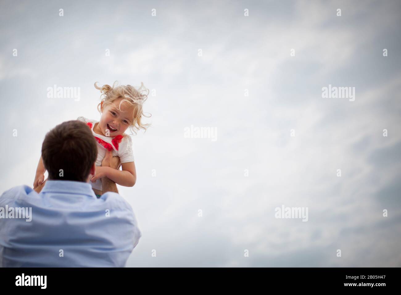 Father lifting daughter beach hi-res stock photography and images - Alamy