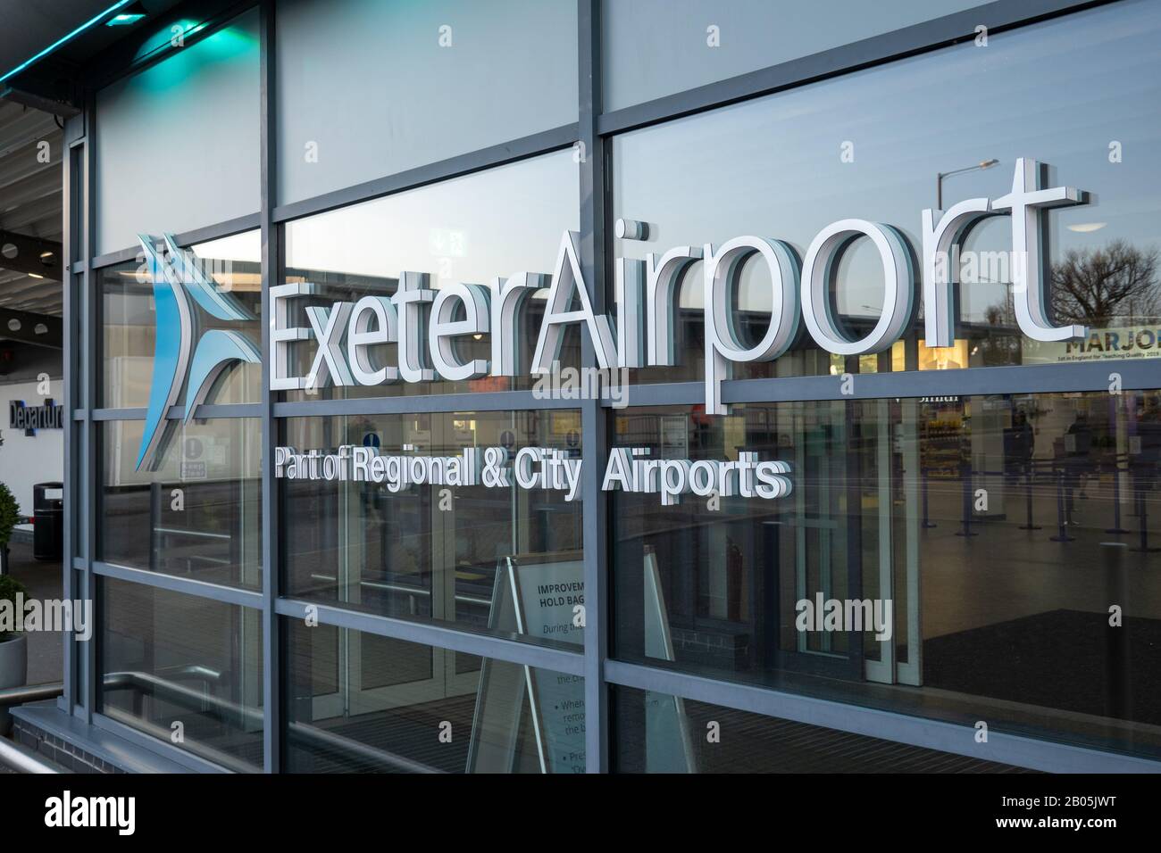 Exeter Airport Terminal Building sign Stock Photo - Alamy