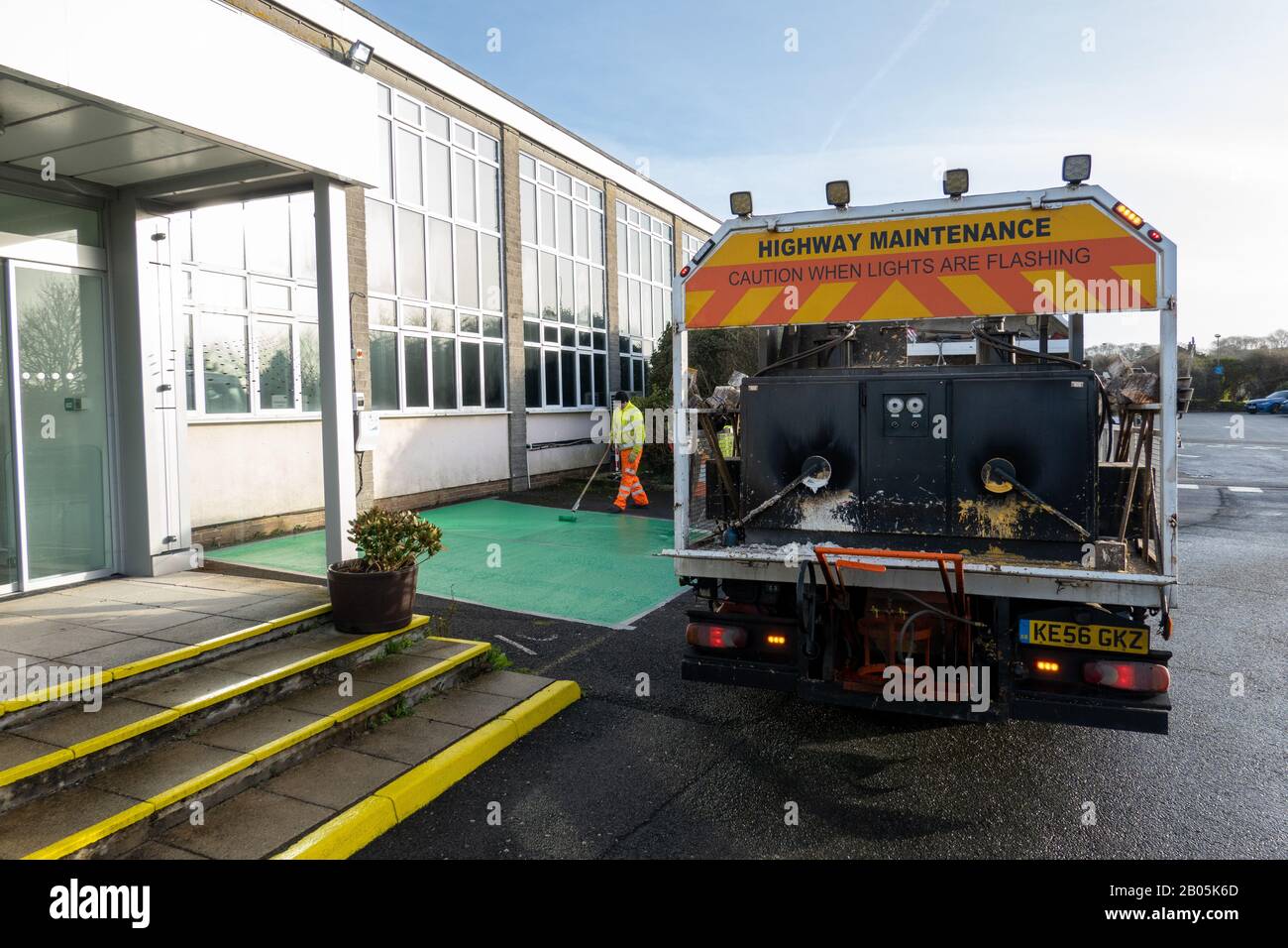 Electric Vehicle Bays being marked out Stock Photo - Alamy