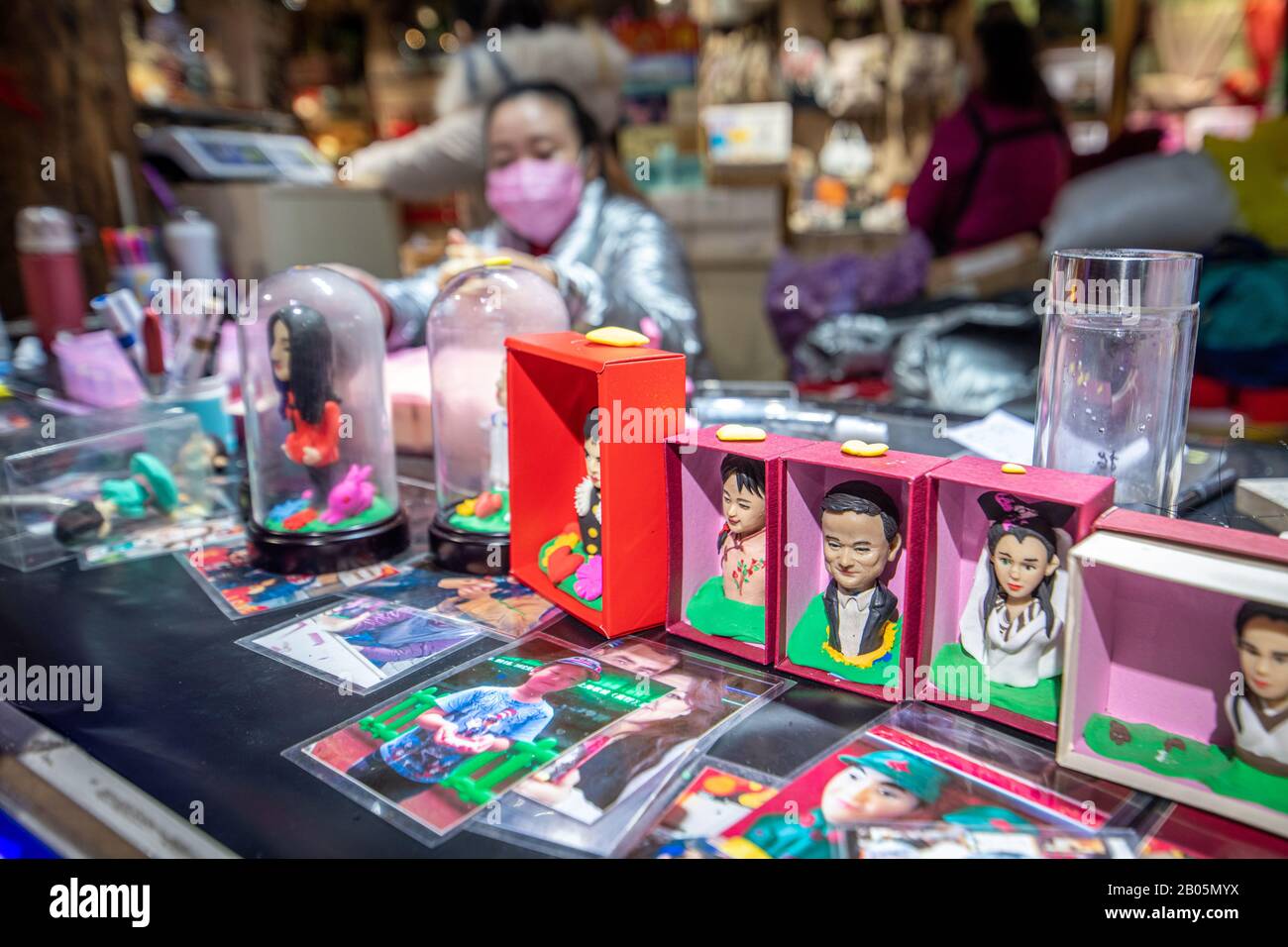 Clay sculptures on display in a marketplace in Shanghai, China Stock ...