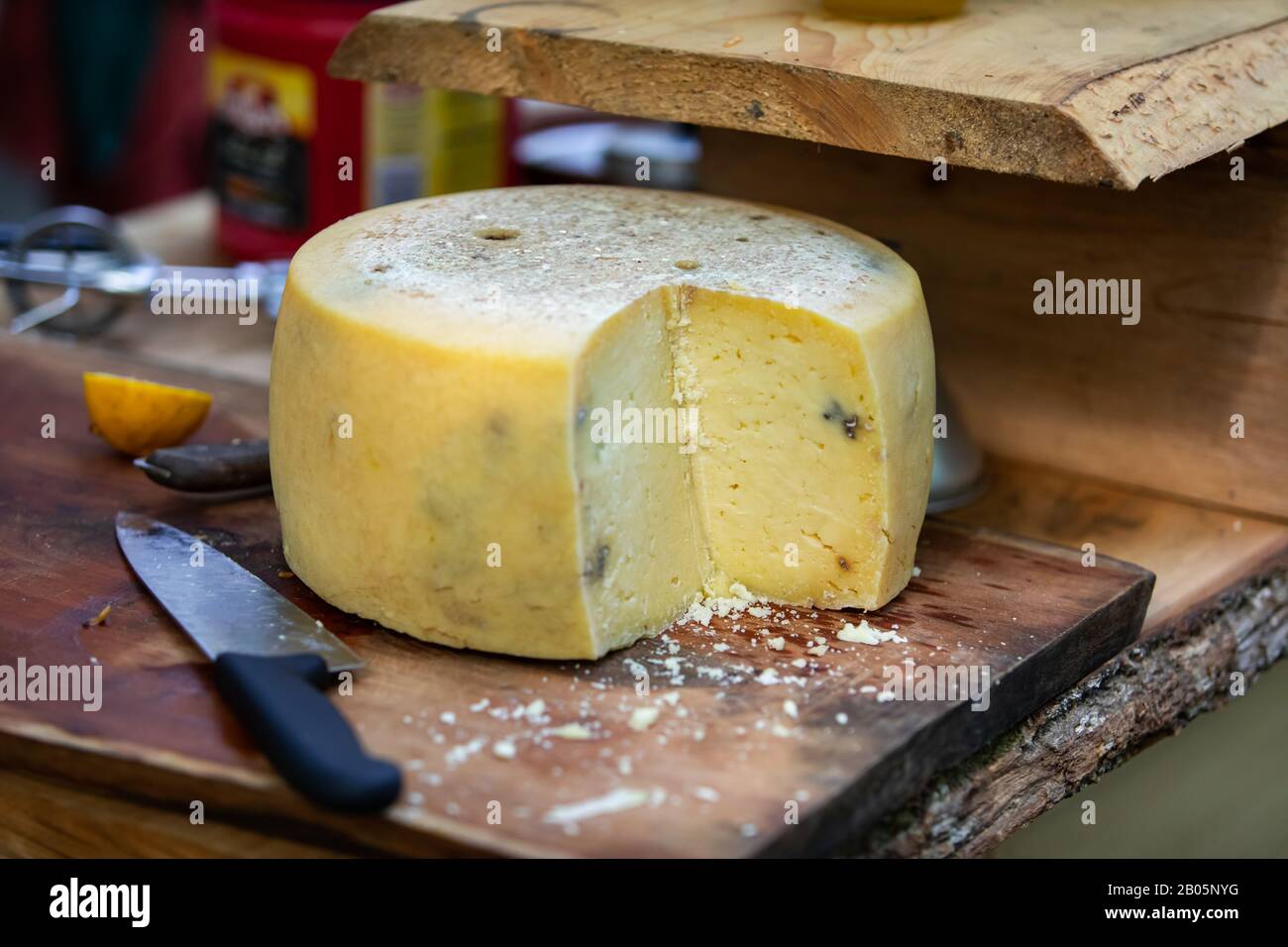 Vintage cheddar cheese wheel hi-res stock photography and images - Alamy