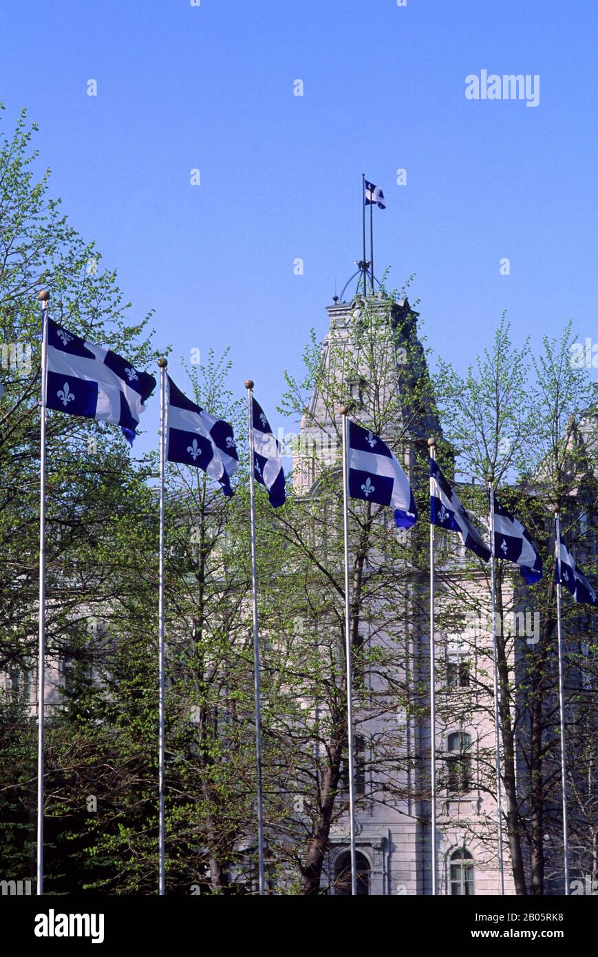 CANADA,QUEBEC,QUEBEC CITY, QUEBEC PROVINCIAL FLAGS IN FRONT OF ...