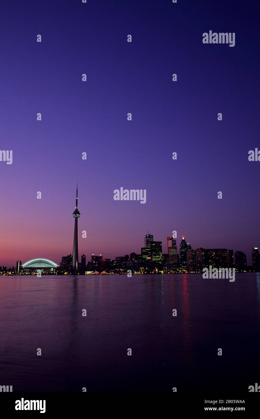 CANADA, ONTARIO, TORONTO, SKYLINE WITH SKY DOME AND CN TOWER, EVENING ...