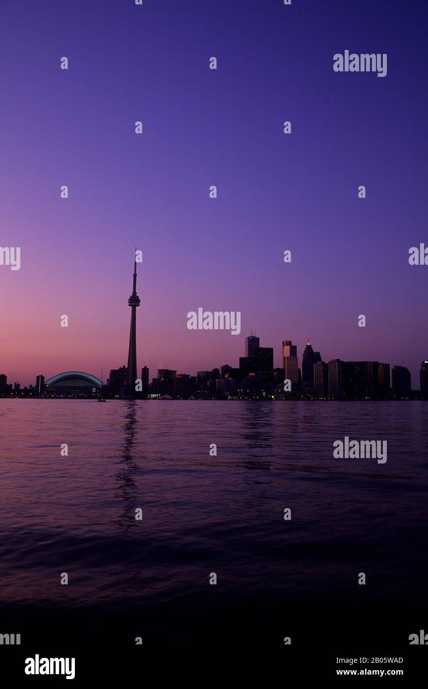 CANADA, ONTARIO, TORONTO, SKYLINE WITH SKY DOME AND CN TOWER, EVENING ...